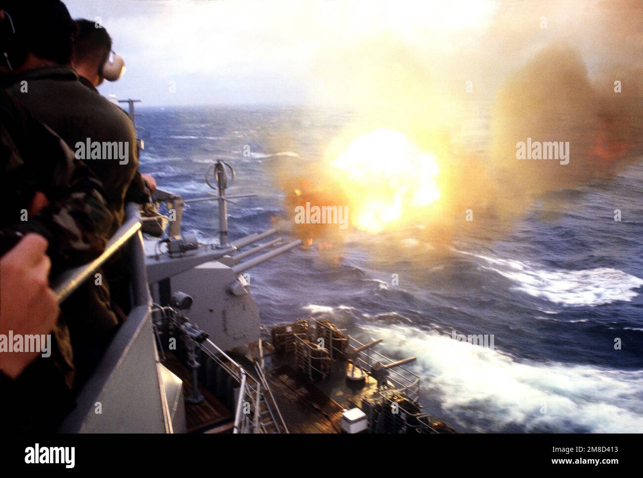 One of the Mark 28 5-inch/38-caliber guns aboard the battleship USS ...