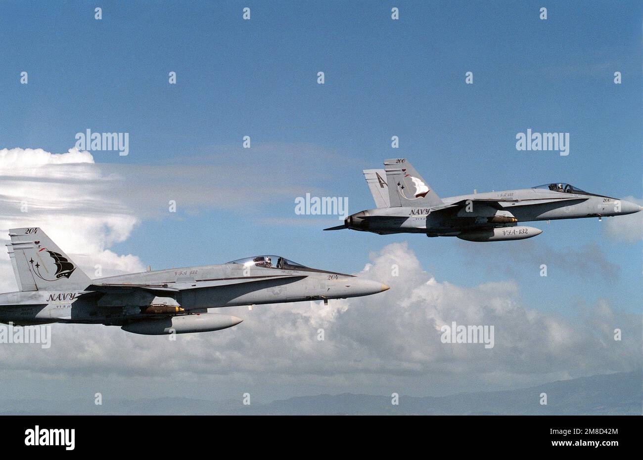 A right side view of two Strike Fighter Squadron 132 (VFA-132) F/A-18A ...