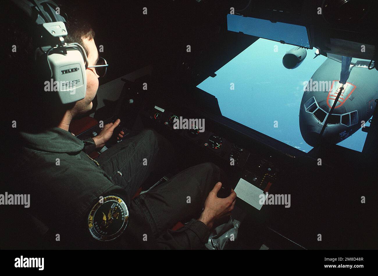 STAFF SGT. Bill Ward, the boom operator aboard a 77th Aerial Refueling ...