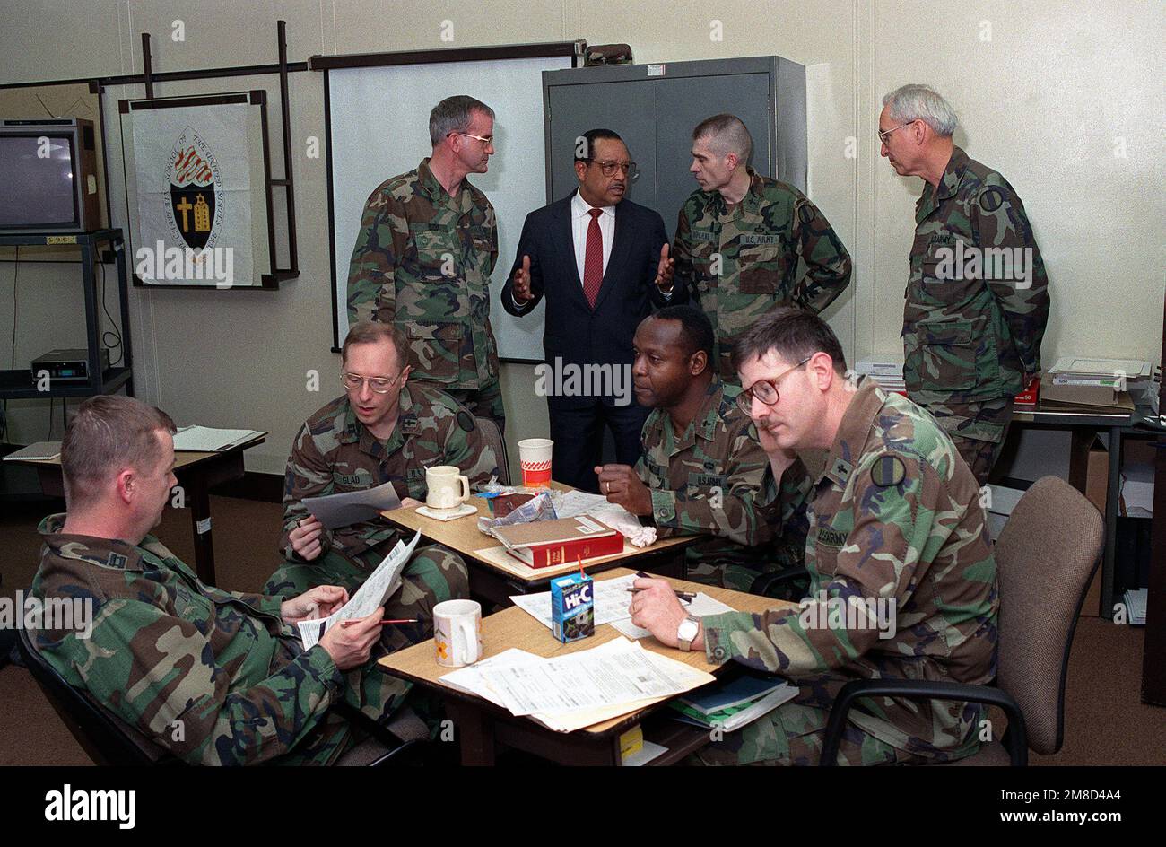 John W. Shannon, undersecretary of the Army, speaks with a member of ...