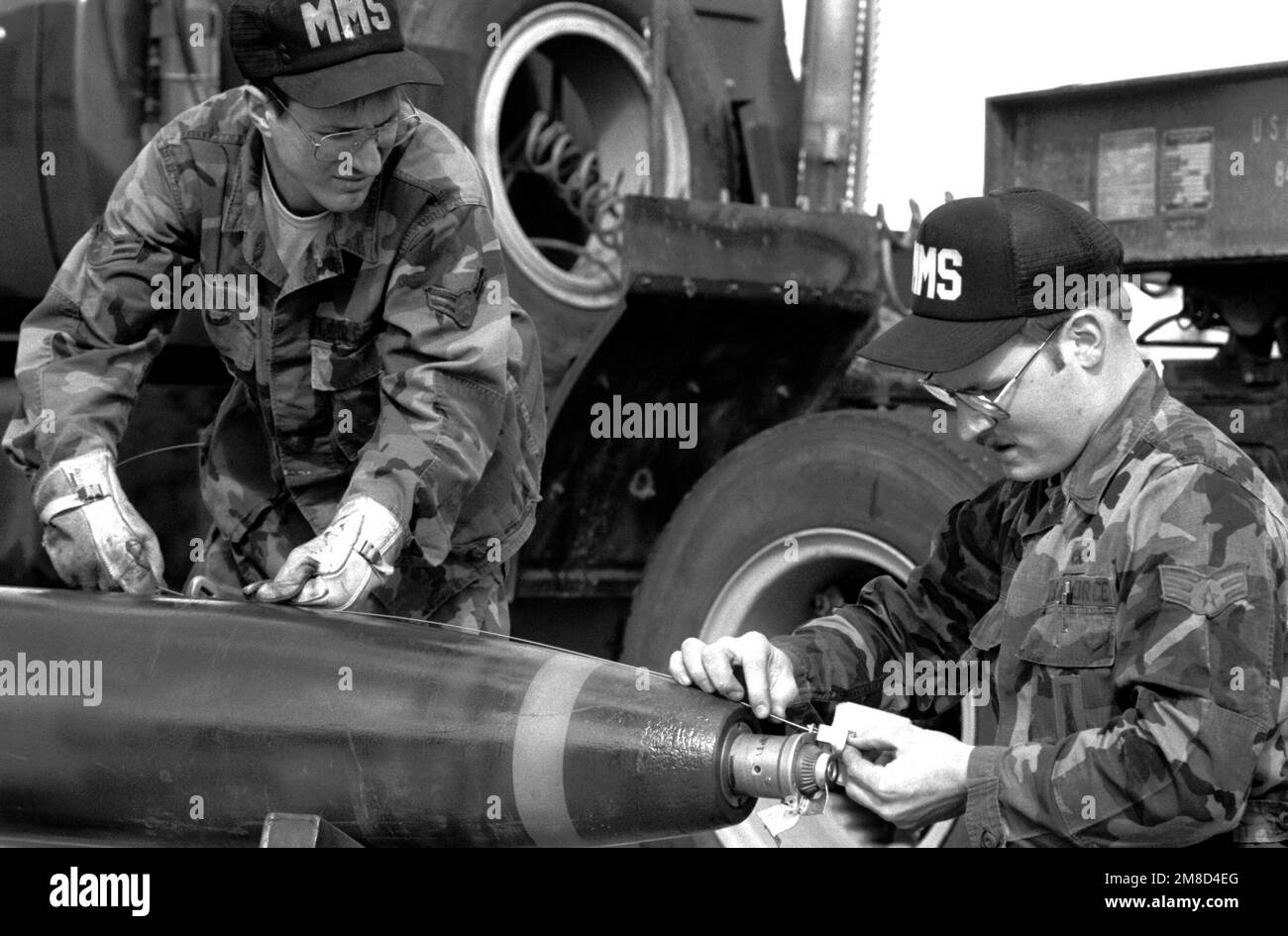 AIC Sam Greendorfer and SRA Doug Klugman, 92nd Munitions Maintenance ...