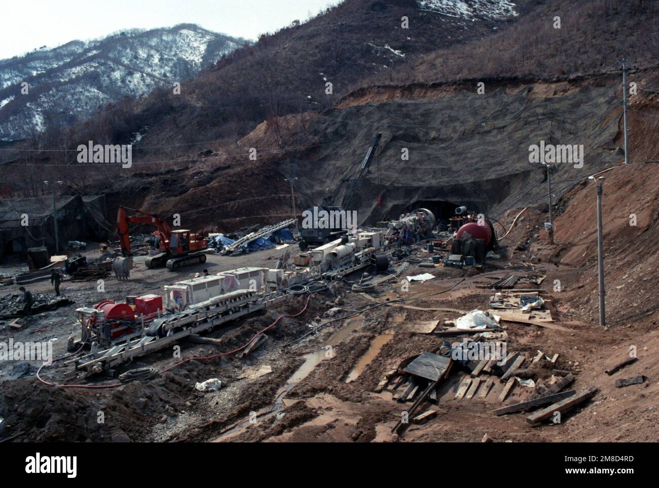 Disassembled tunnel boring equipment awaits removal from the site as it ...