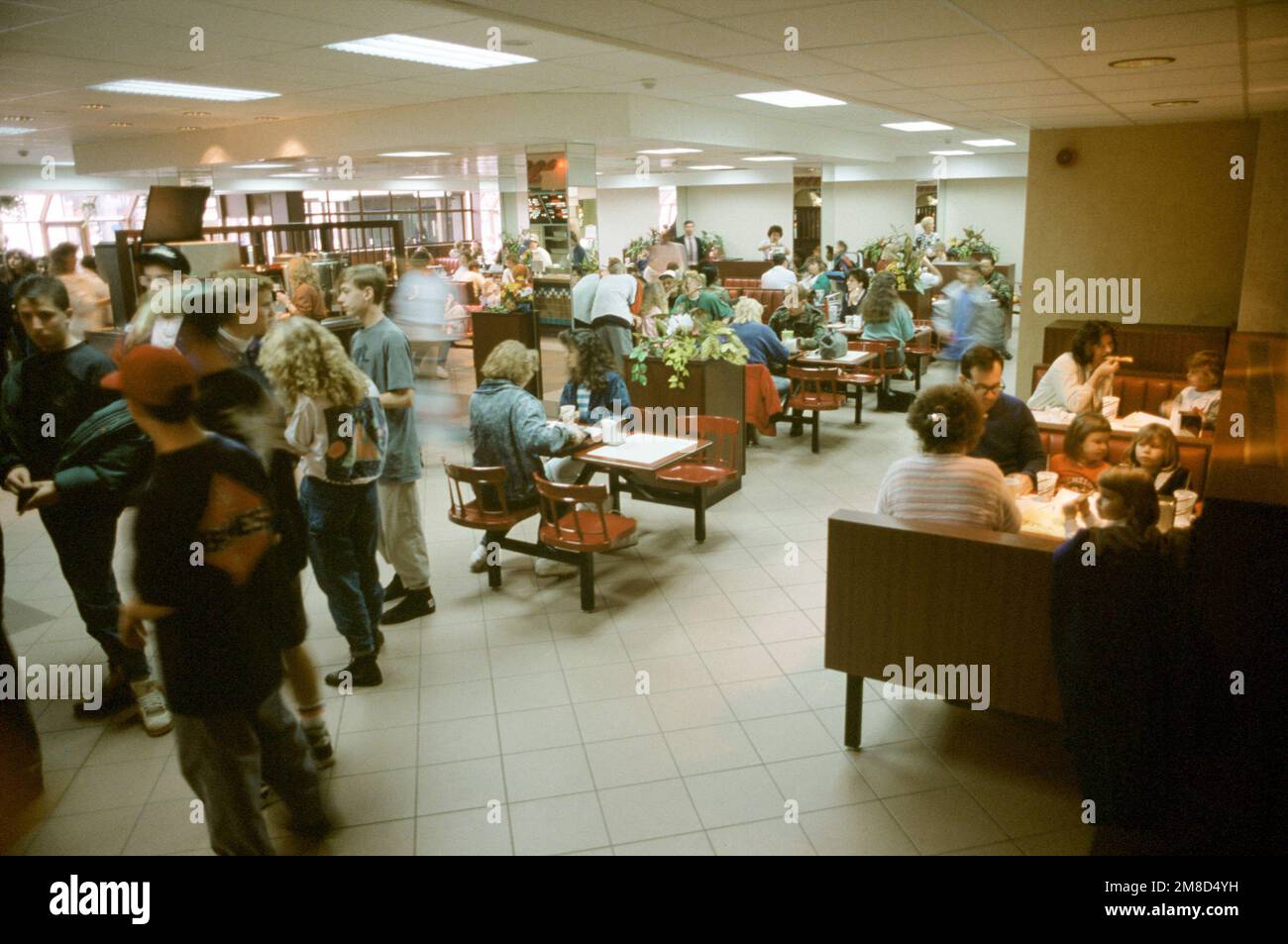 Shoppers eat in a fast food establishment at the Army/Air Force ...