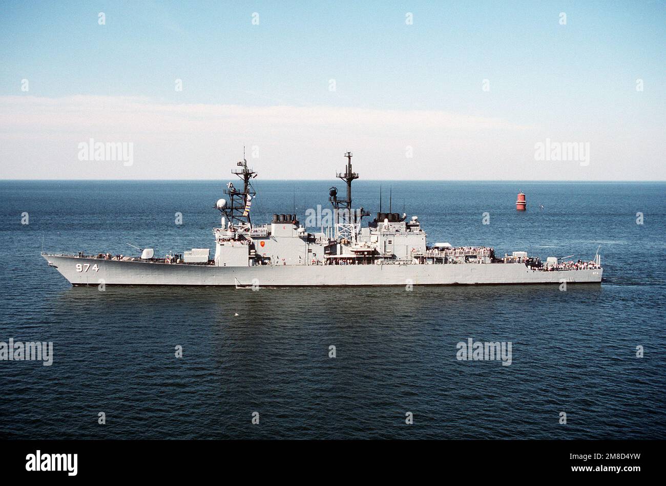 A port beam view of the destroyer USS COMTE DE GRASSE (DD-974) entering ...