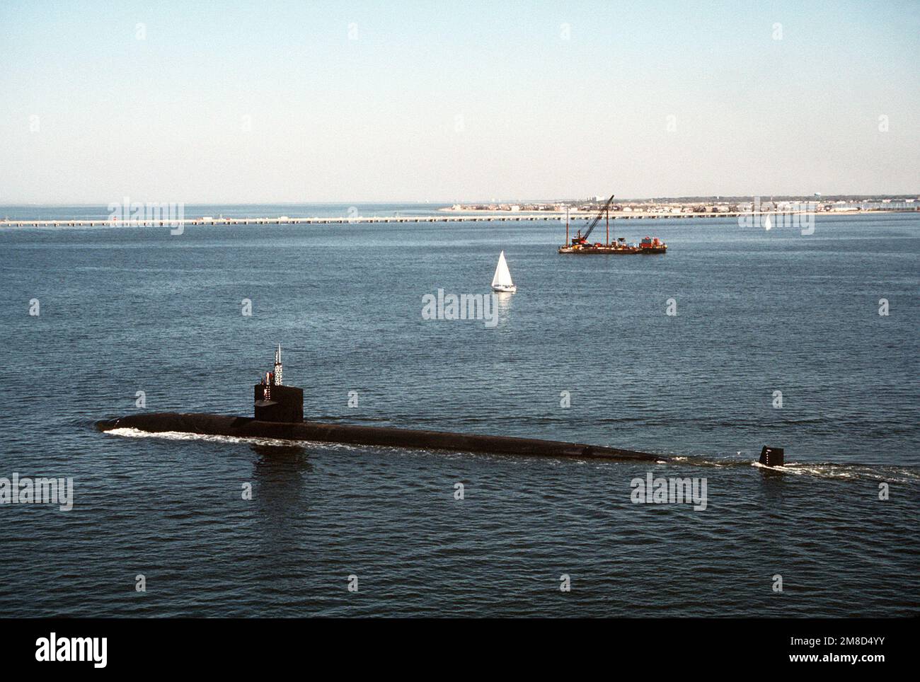A port bow view of the nuclear-powered attack submarine USS PROVIDENCE (SSN-719) underway in the ...