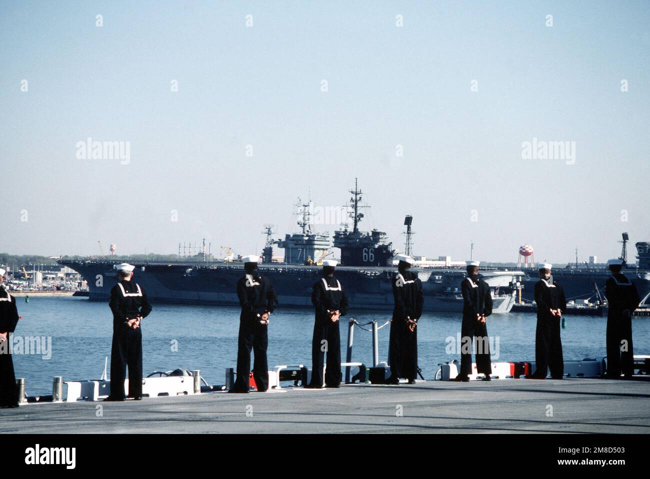 Sailors man the rails aboard the amphibious assault ship USS WASP (LHD ...