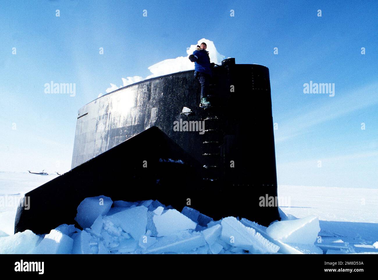 Senator Albert Gore of Tennessee climbs the sail structure of the ...