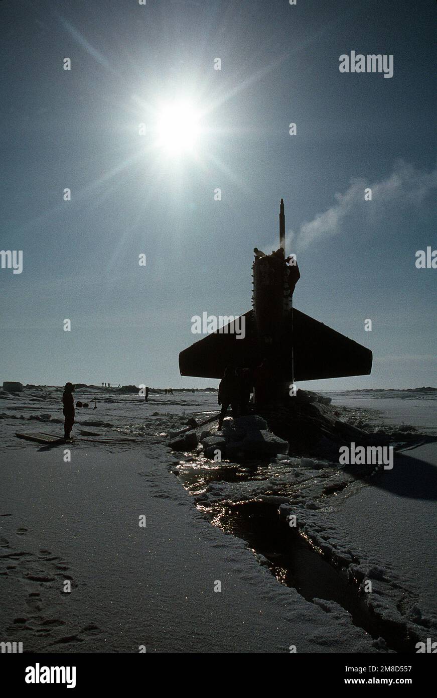 Crew members emerge from the nuclear-powered submarine USS SEAHORSE ...