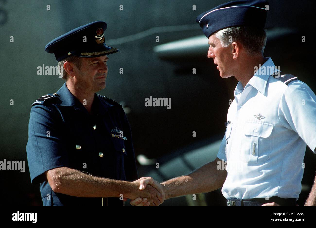 Group Captain Bruce Woods, left, officer in charge, Royal Australian ...