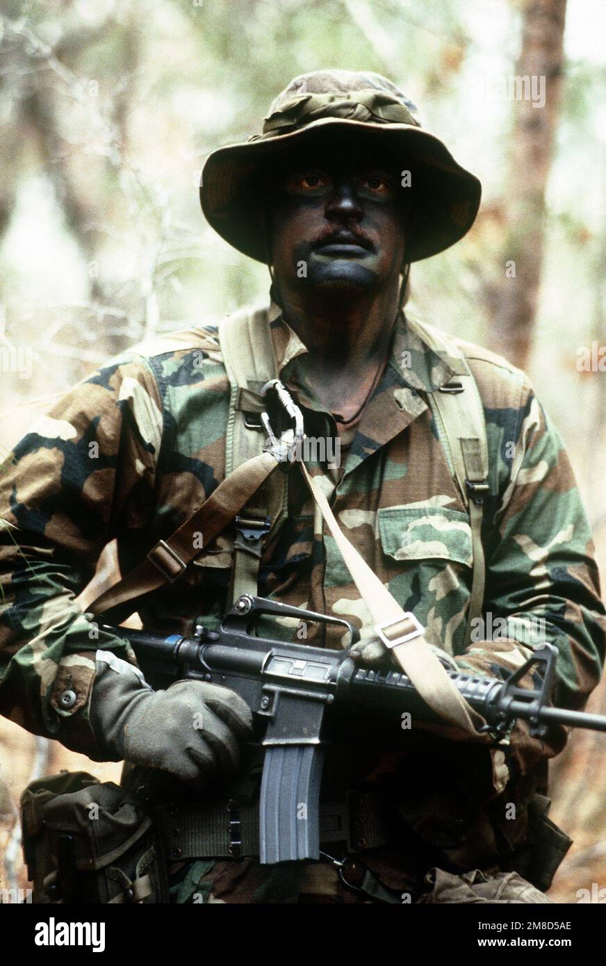 A member of the 1720th Special Tactics Group carrying a Colt Commando ...