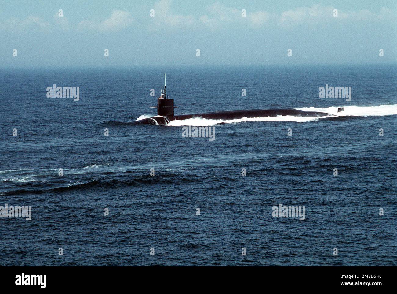 A port bow view of the strategic missile submarine USS TENNESSEE (SSBN ...