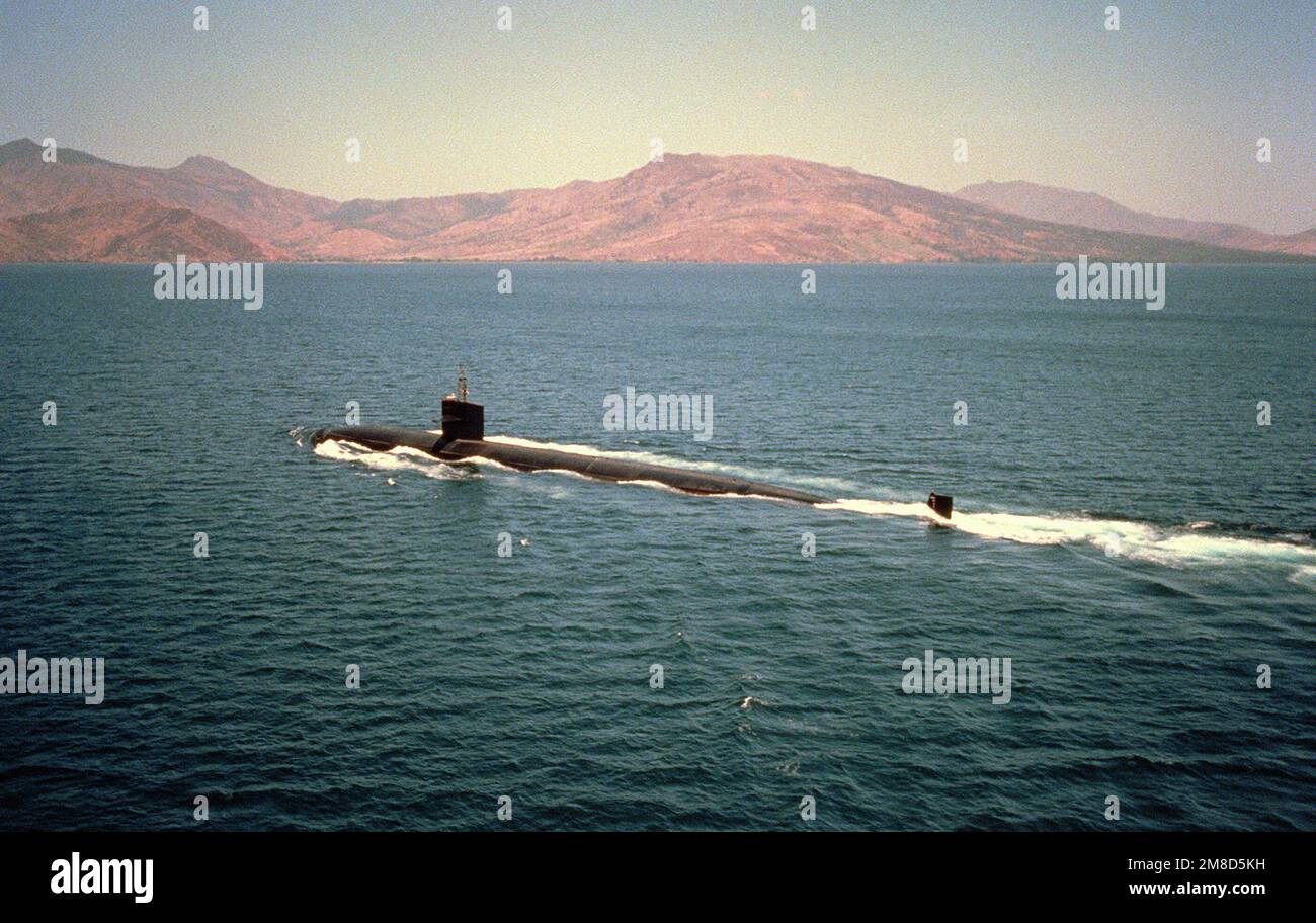 A port quarter view of the nuclear-powered submarine USS OMAHA (SSN-692 ...