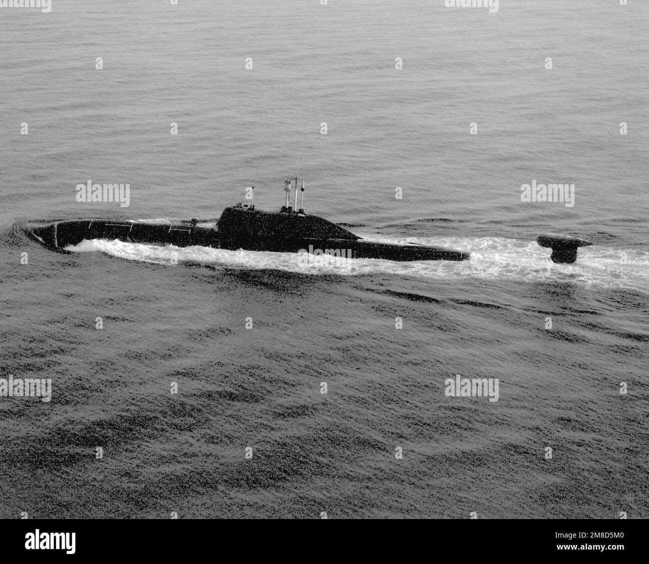 A port view of a Soviet Akula class nuclear-powered attack submarine ...