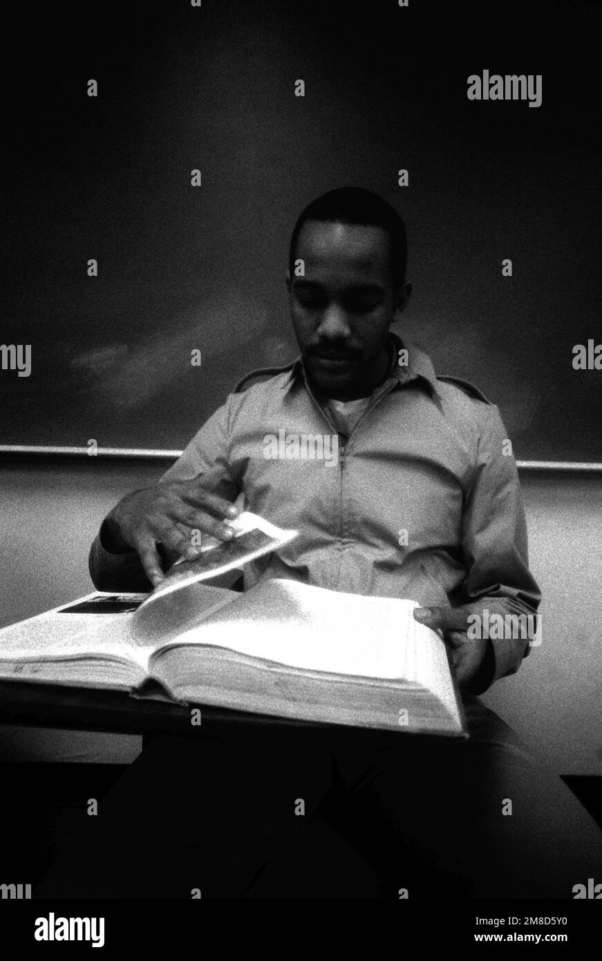 Midshipman Mikele M. Bates, a member of the ROTC program, attends a ...