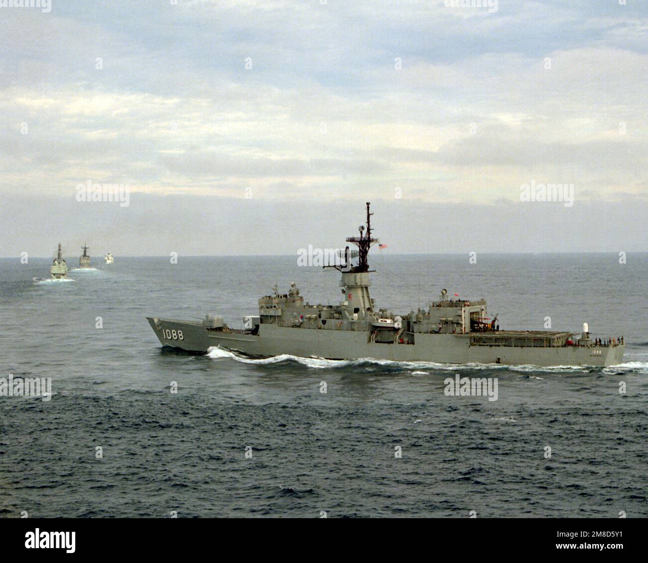 A port beam view of the frigate USS BARBEY (FF-1088) underway. Country ...