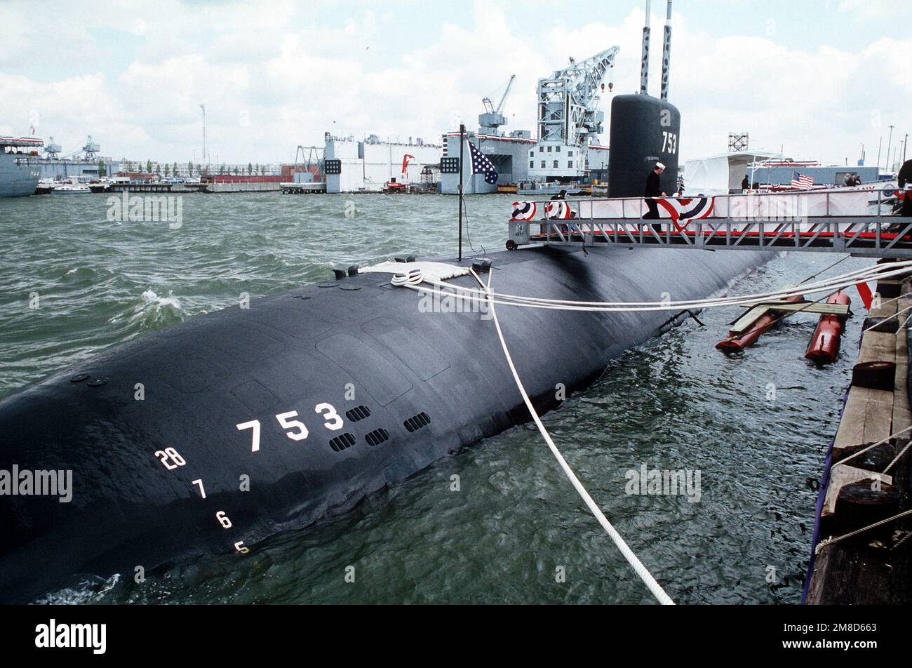 Mooring lines secure the nuclear-powered attack submarine USS ALBANY ...