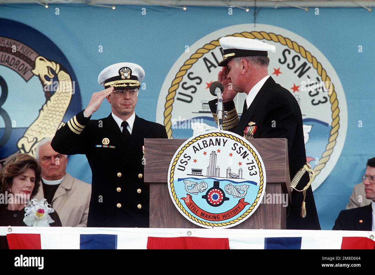 Commander Carl R. Anderson, Commanding Officer, salutes Vice Admiral ...