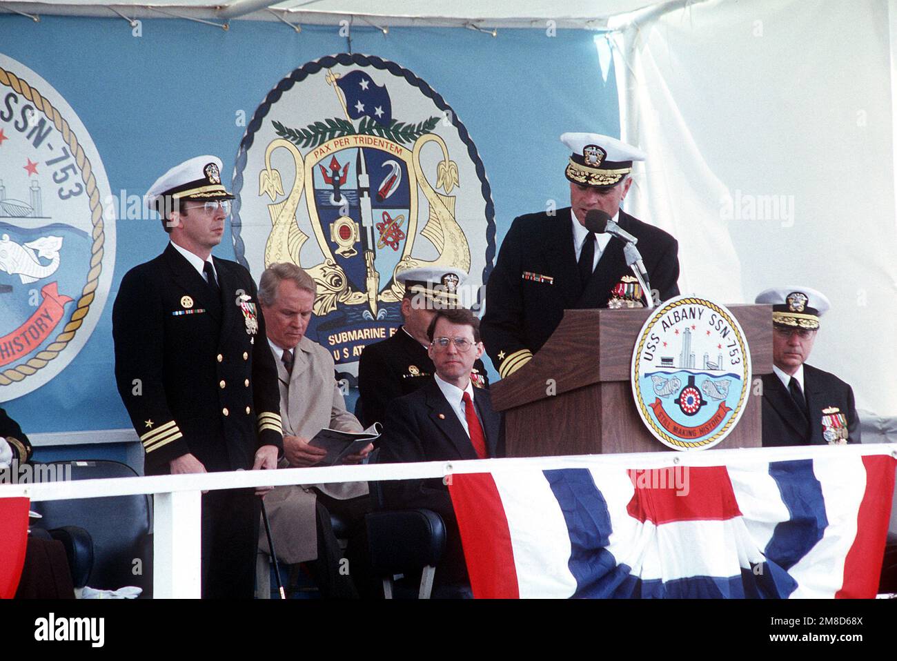 Commander Carl R. Anderson, Commanding Officer, stands as Vice Admiral ...
