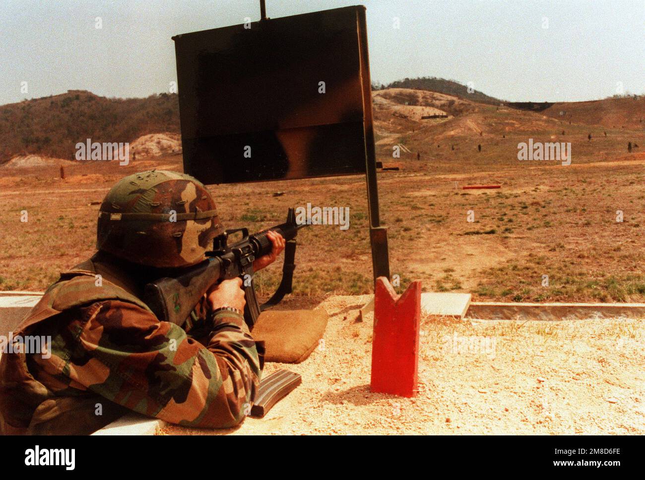 Marine firing a M16A2 rifle during training at Mexico Range. Country ...