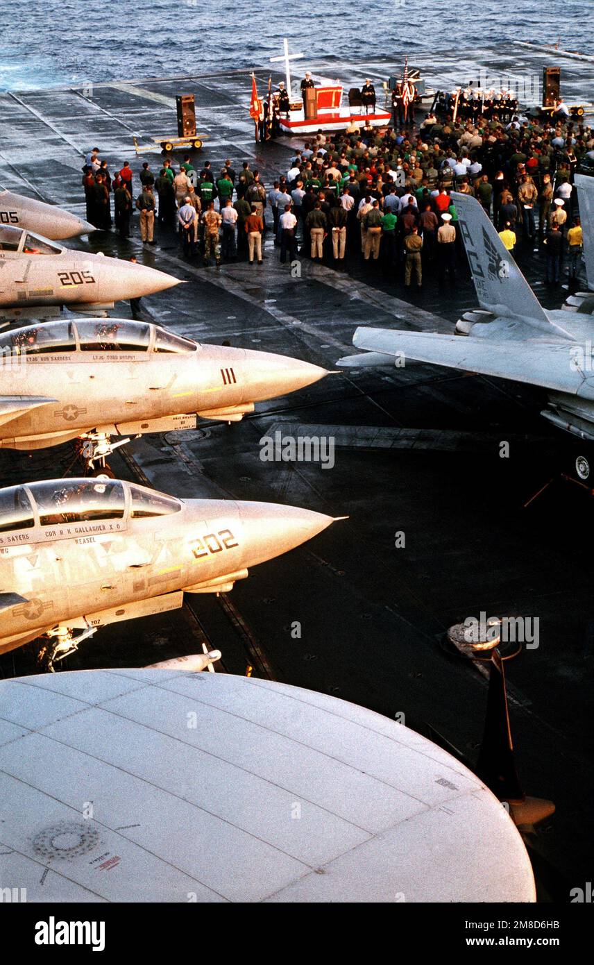 The crew of the nuclear-powered aircraft carrier USS DWIGHT D ...