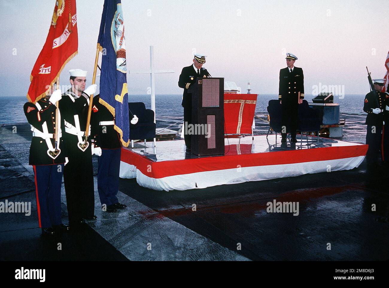 CMDR. James Mennis, command chaplain, conducts a sunrise Easter service ...