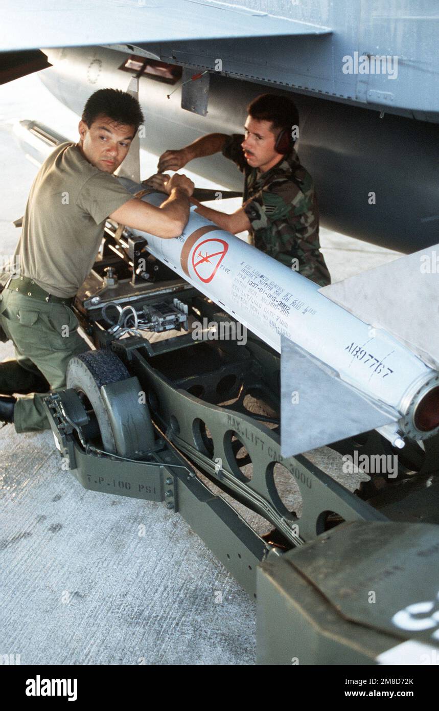 An AIM-7 Sparrow missile is loaded onto an aircraft. Base: Tyndall Air ...