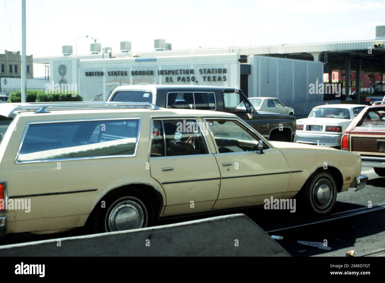 Vehicles entering the United States pull into the United States ...