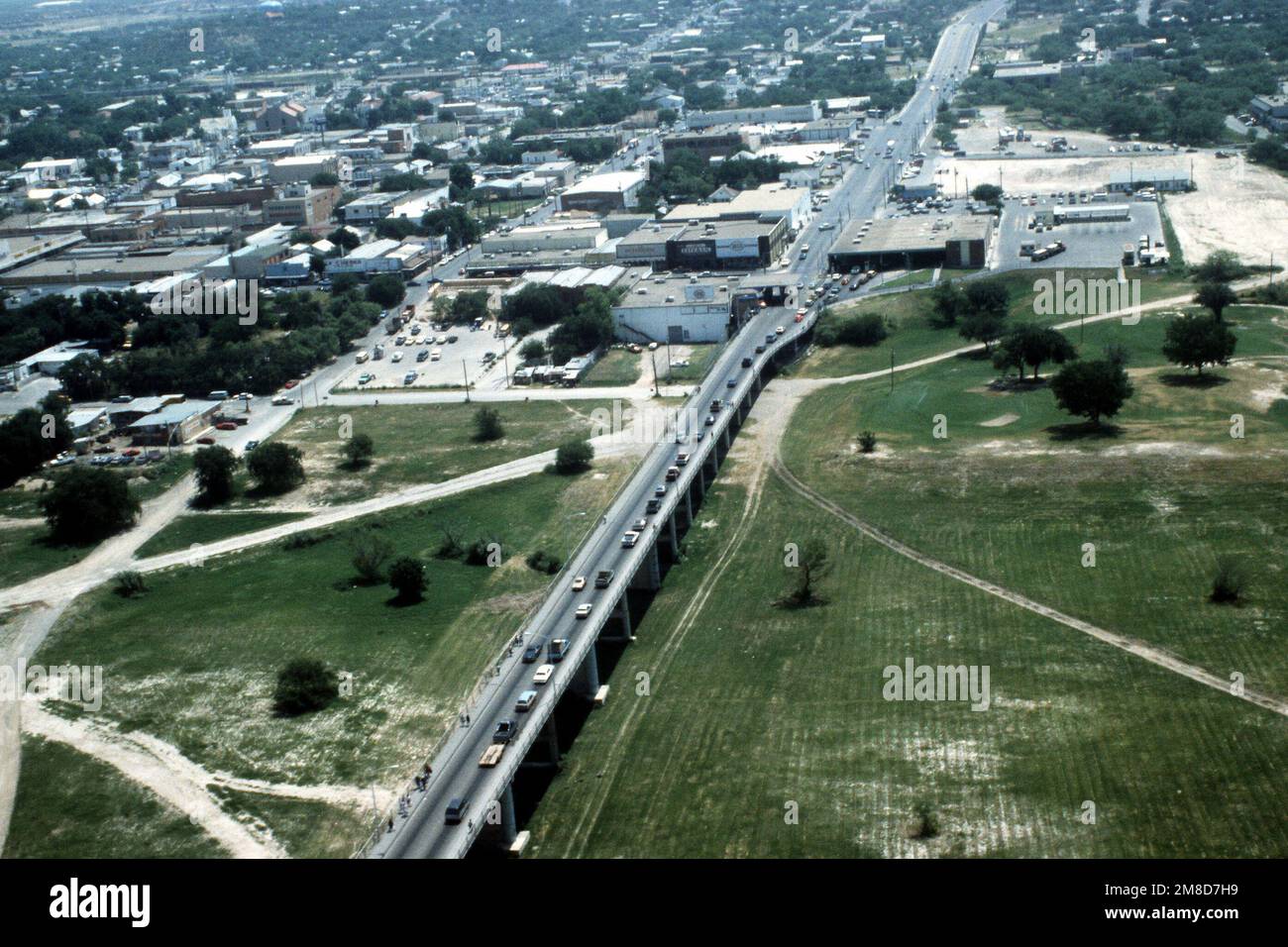 An aerial view of an unidentified border inspection station. The U.S ...