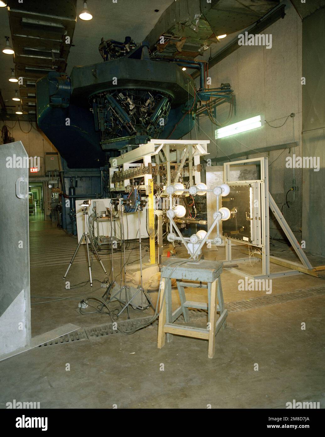 Lights illuminate an XM230E1 30mm chain gun/cannon mounted on a test ...