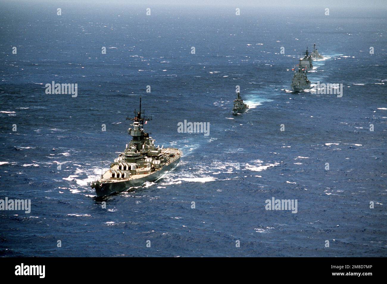 A port bow view of the battleship USS MISSOURI (BB-63) underway with ...