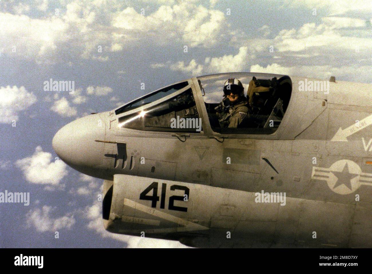 Lieutenant Commander Bud Warfield smiles from the cockpit of an Attack ...