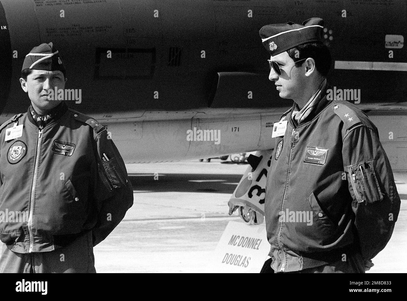 Two Turkish air force pilots stand beside one of the aircraft being ...
