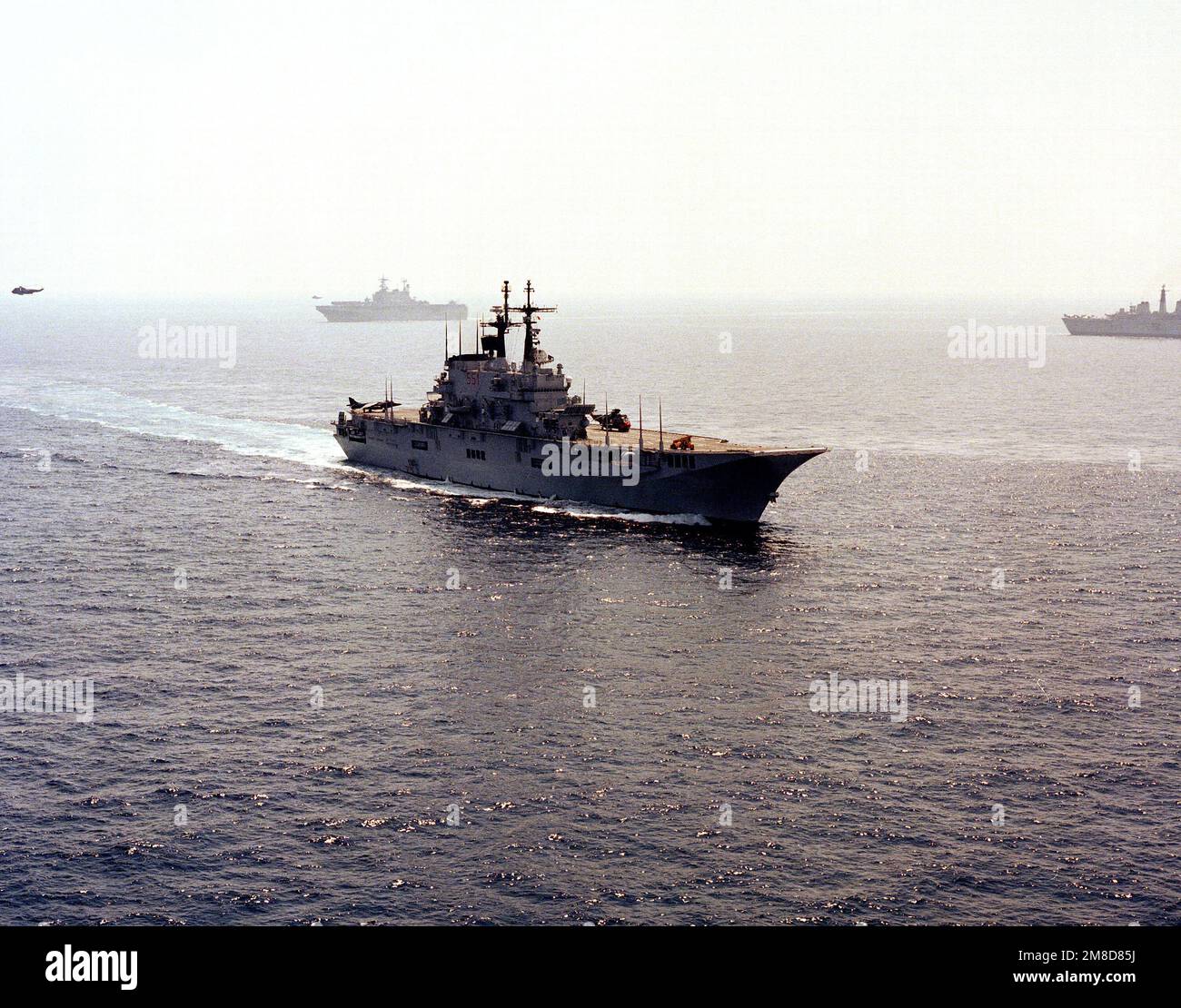 A starboard bow view of the Italian light aircraft carrier ITS GIUSEPPE ...