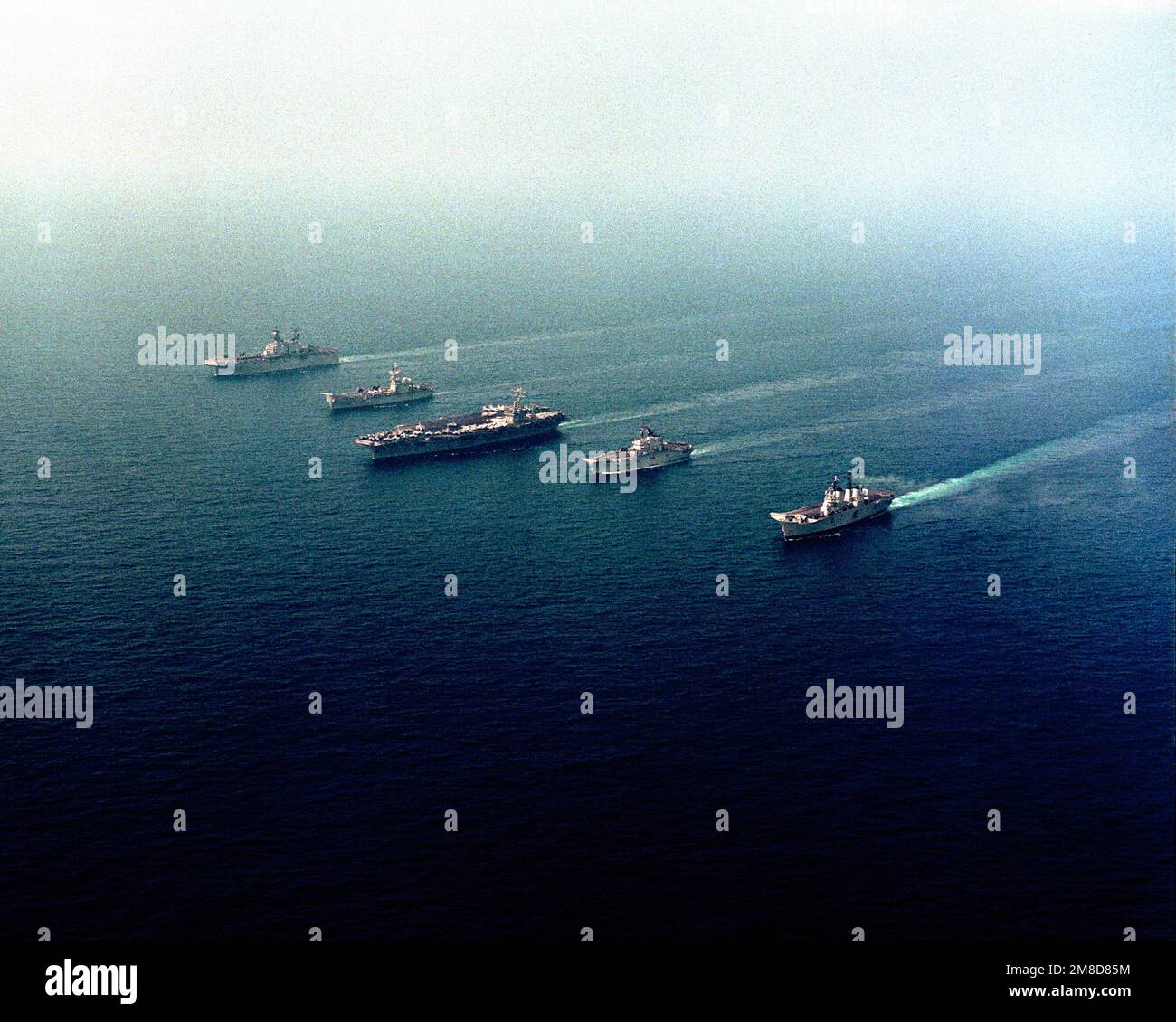 Ships from four nations sail alongside one another during the NATO ...
