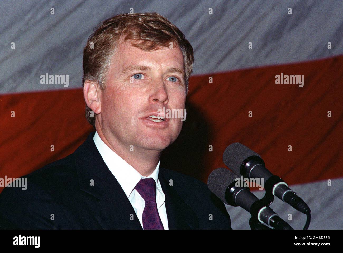 Vice President Dan Quayle speaks to crew members during a visit aboard ...