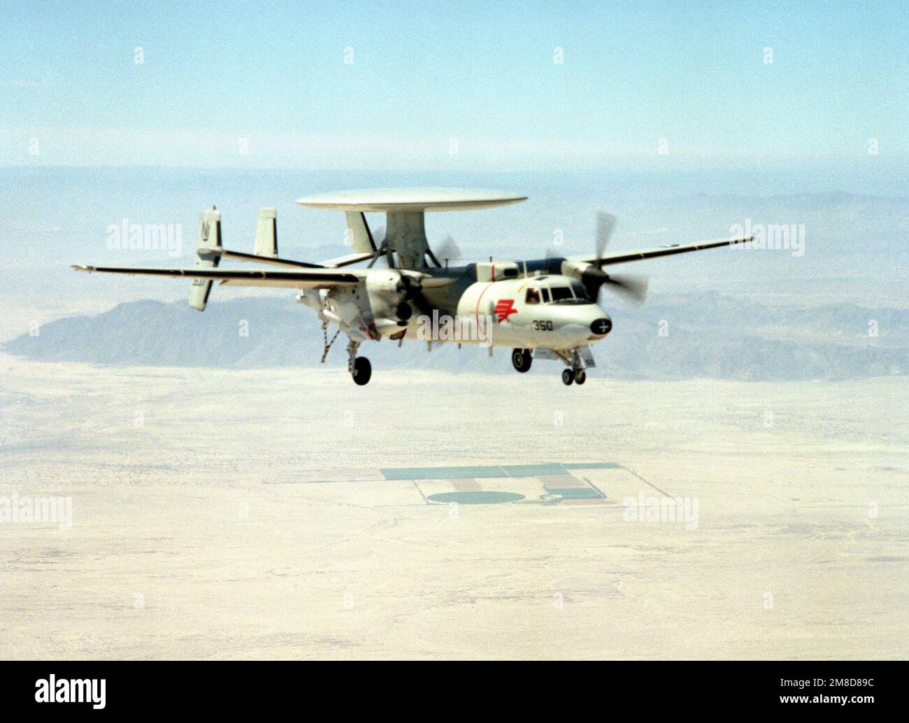 An air-to-air right front view of an Airborne Early Warning Squadron ...
