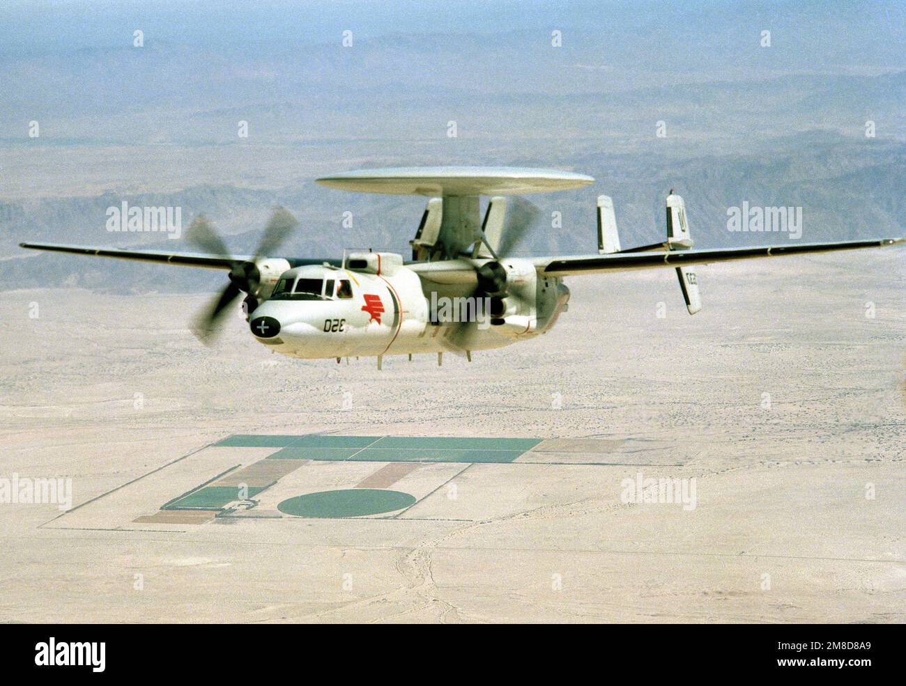 An air-to-air right front view of an Airborne Early Warning Squadron ...