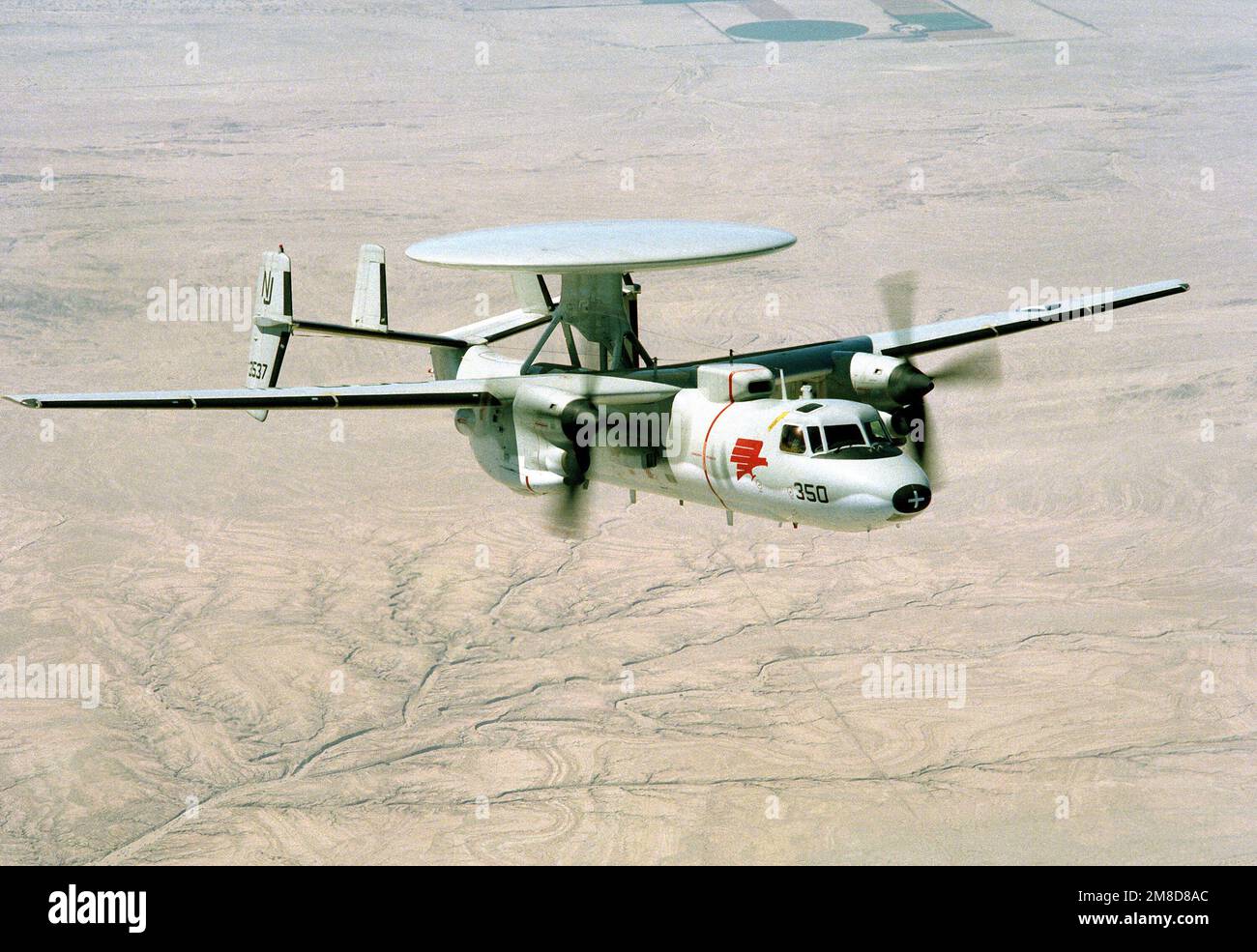 An air-to-air right front view of an Airborne Early Warning Squadron ...