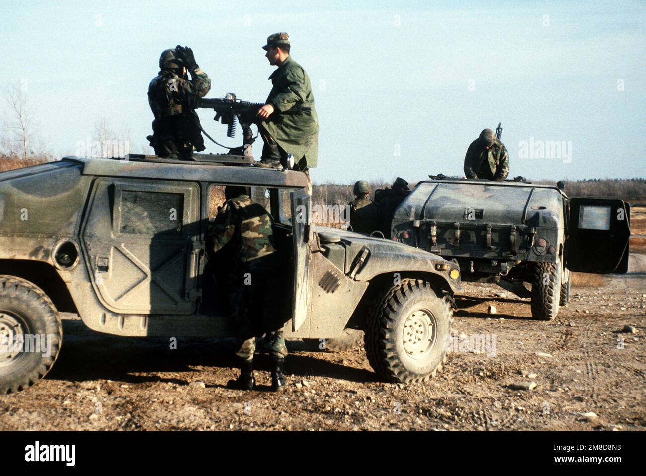 Members of the 295th Military Police Company set up an M60 7.62 mm ...