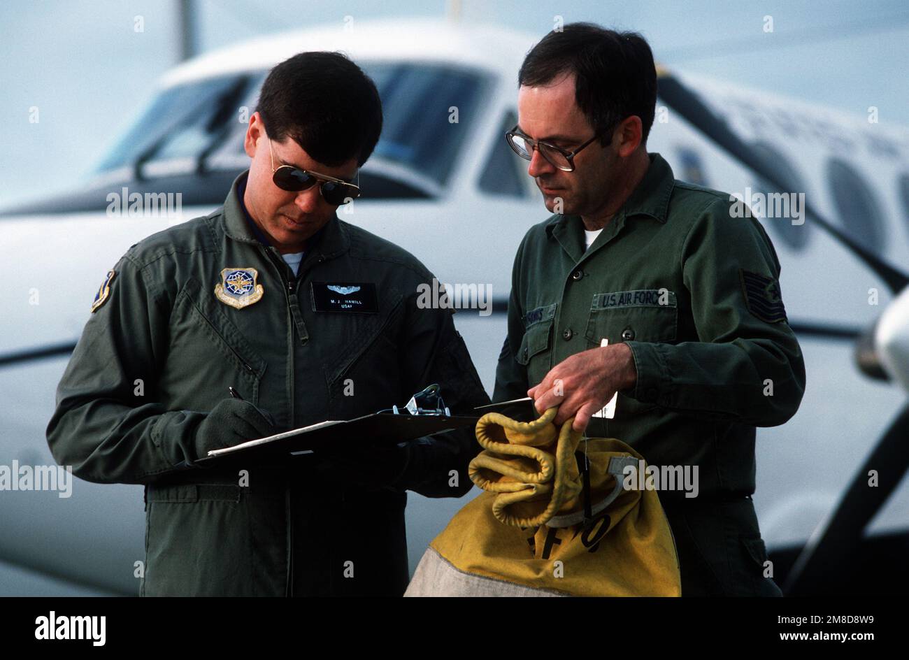 1ST Lieutenant Mike Hamill signs for mail from MASTER Sergeant Jerry ...