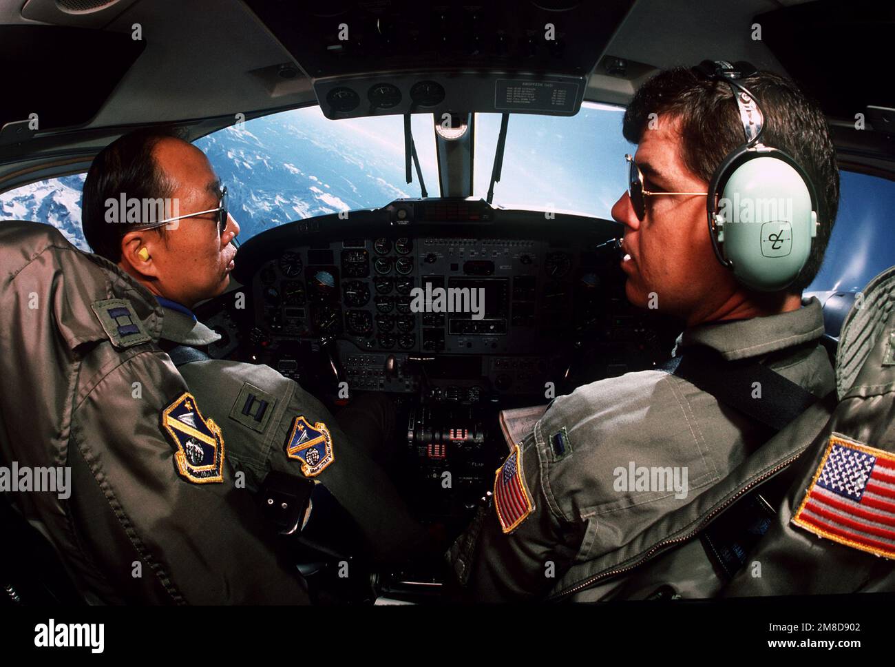 Captain Bill Chu, left, and FIrst Lieutenant Mike Hamill fly their ...