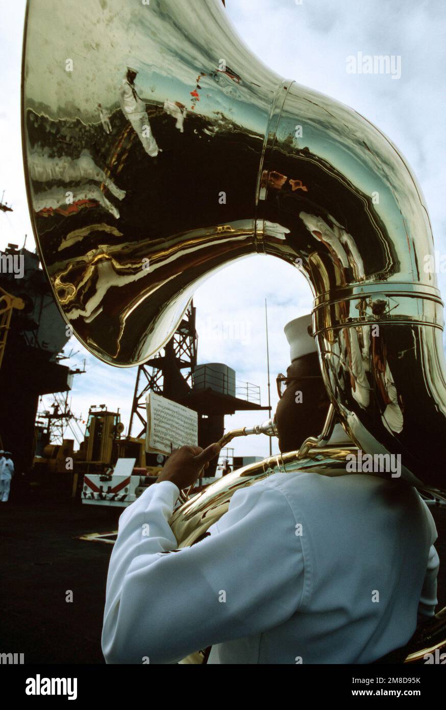 A band member takes part in a musical presentation during the change of ...