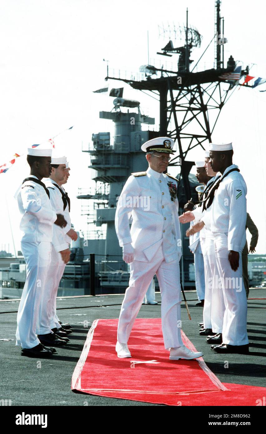 Sideboys stand in formation as Admiral (ADM) Leon A. Edney arrives ...