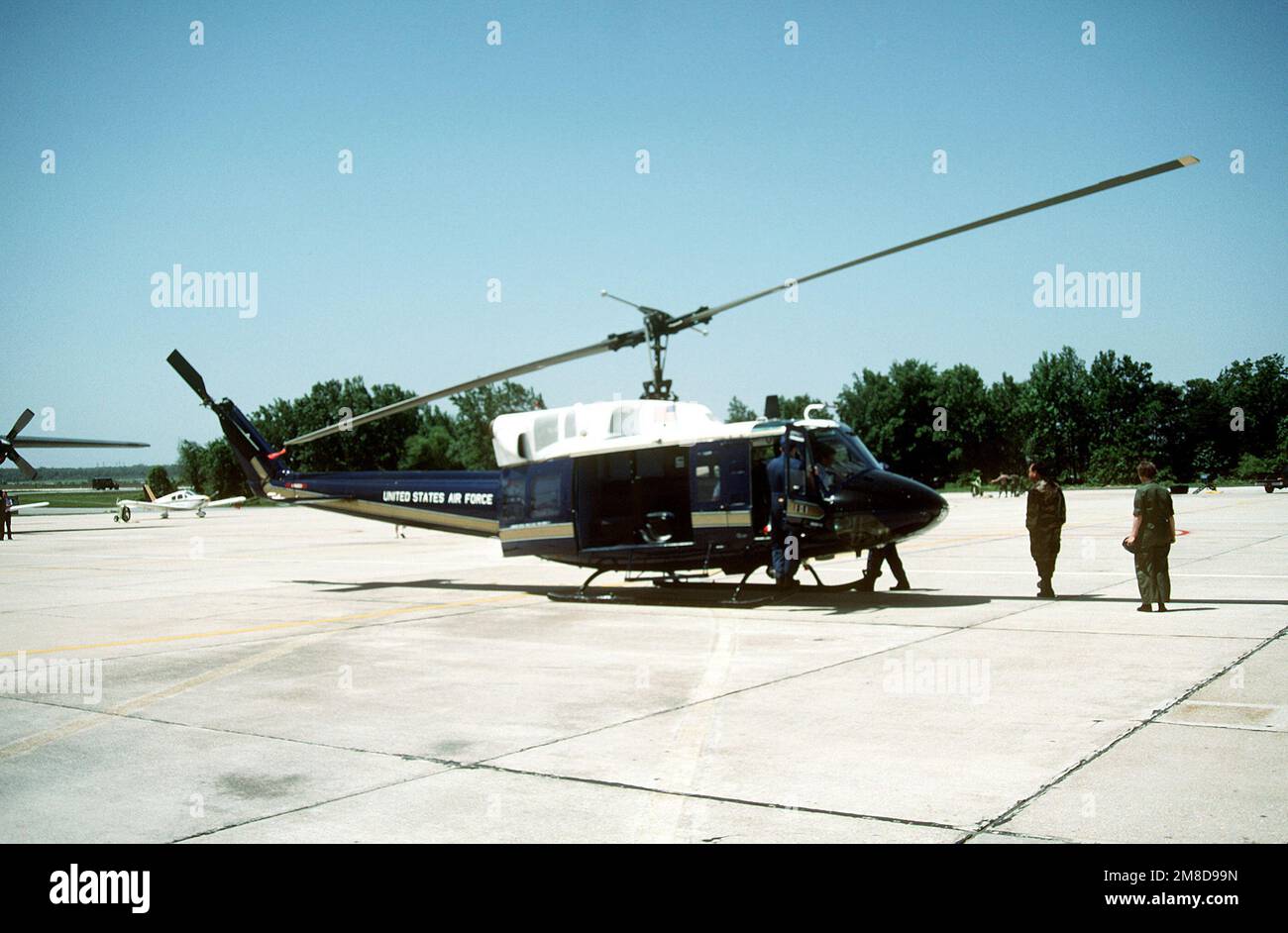 A right side view of an Air Force UH-1N Iroquois helicopter of the 1ST ...