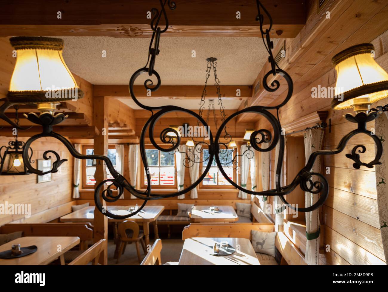 Unusual pendant lamps of a mountain restaurant in the Austrian Alps ...