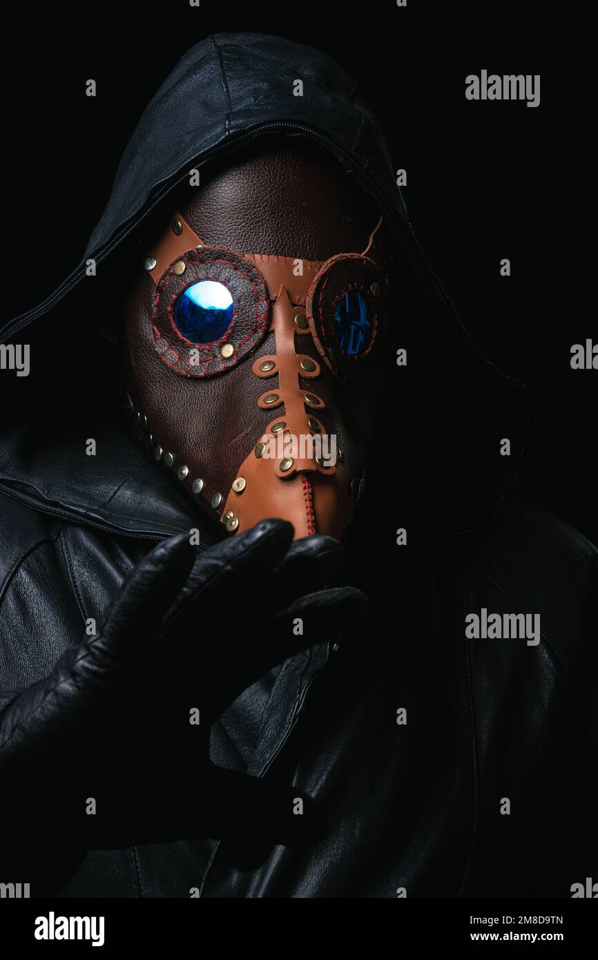 Plague doctor with crow-like mask isolated on black background Creepy ...