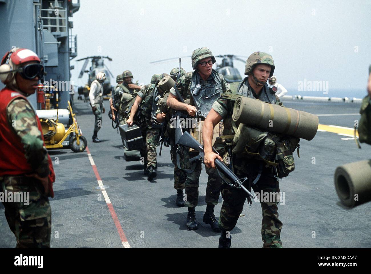 Marines of the 22nd Marine Expeditionary Unit (22nd MEU) are led to a ...