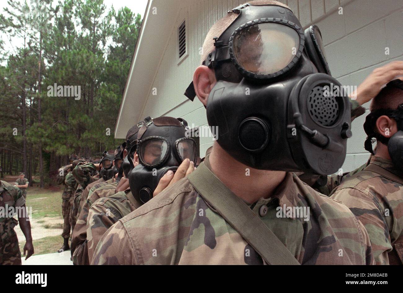 Third Battalion recruits wear M-171A chemical-biological masks as they ...