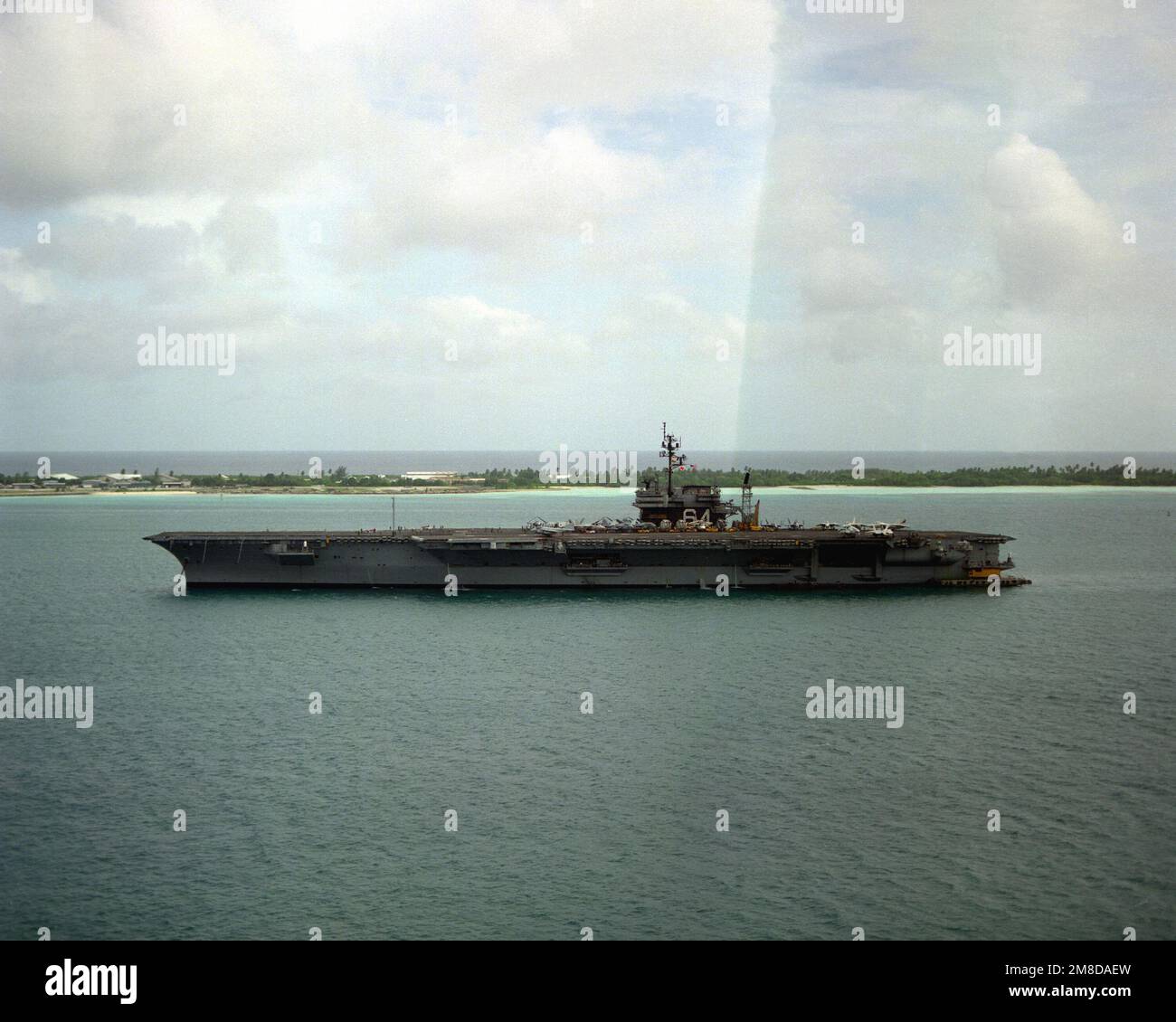 A port beam view of the aircraft carrier USS CONSTELLATION (CV-64 ...