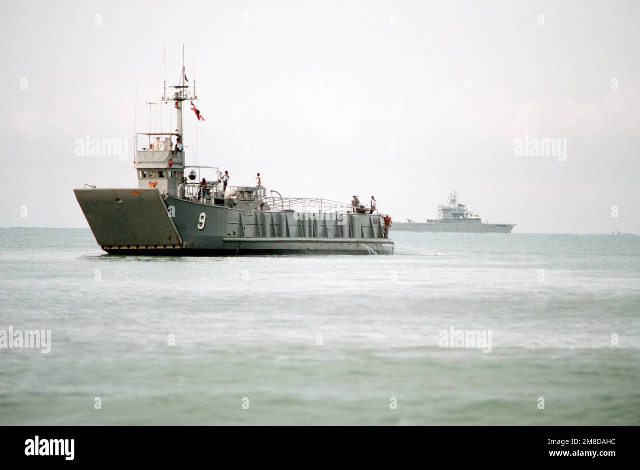 The Thai utility landing craft WANG NOK (LCU-9) approaches the beach ...
